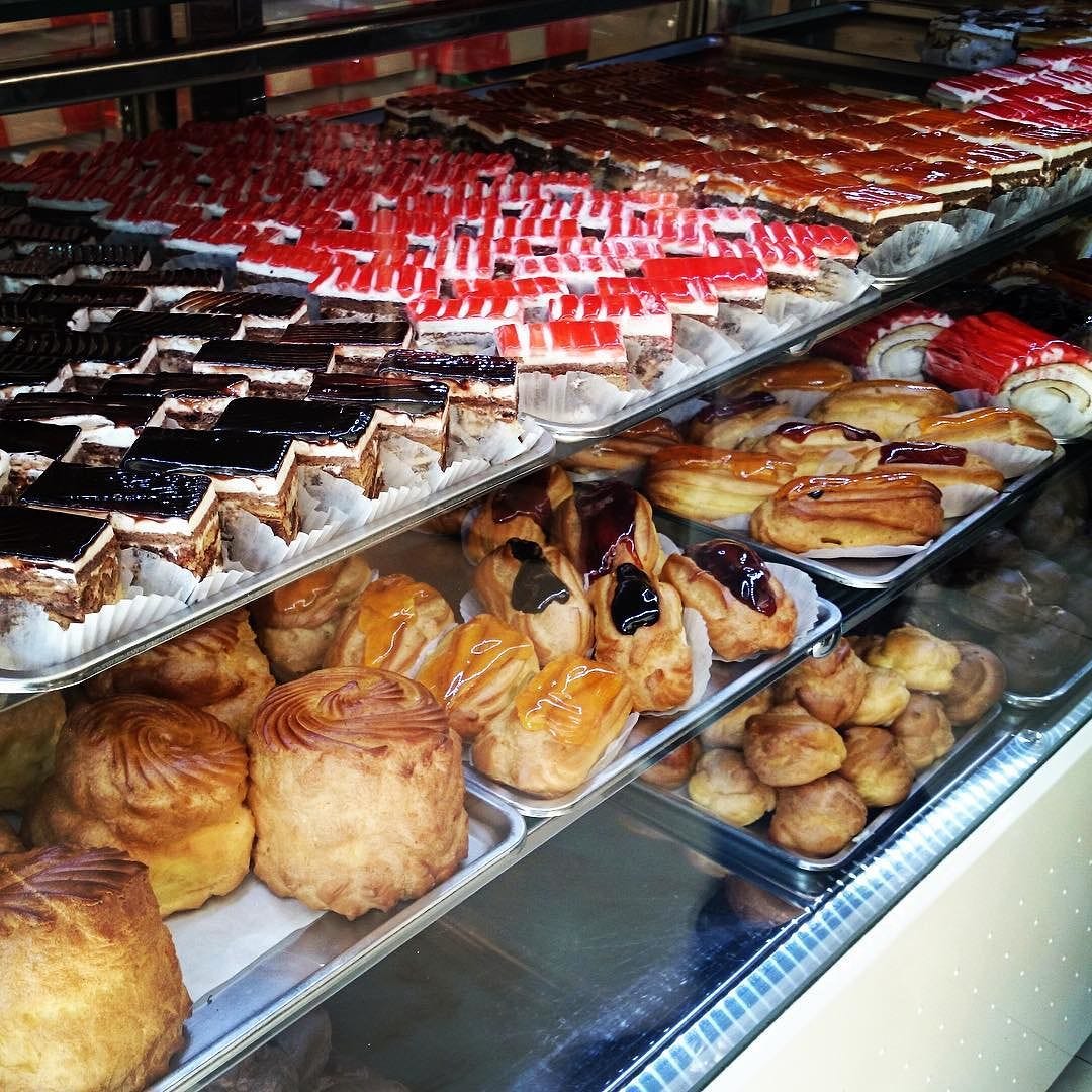 Cream-filled decadent sweets and “shirini danmarki” (Danish sweets) at ...