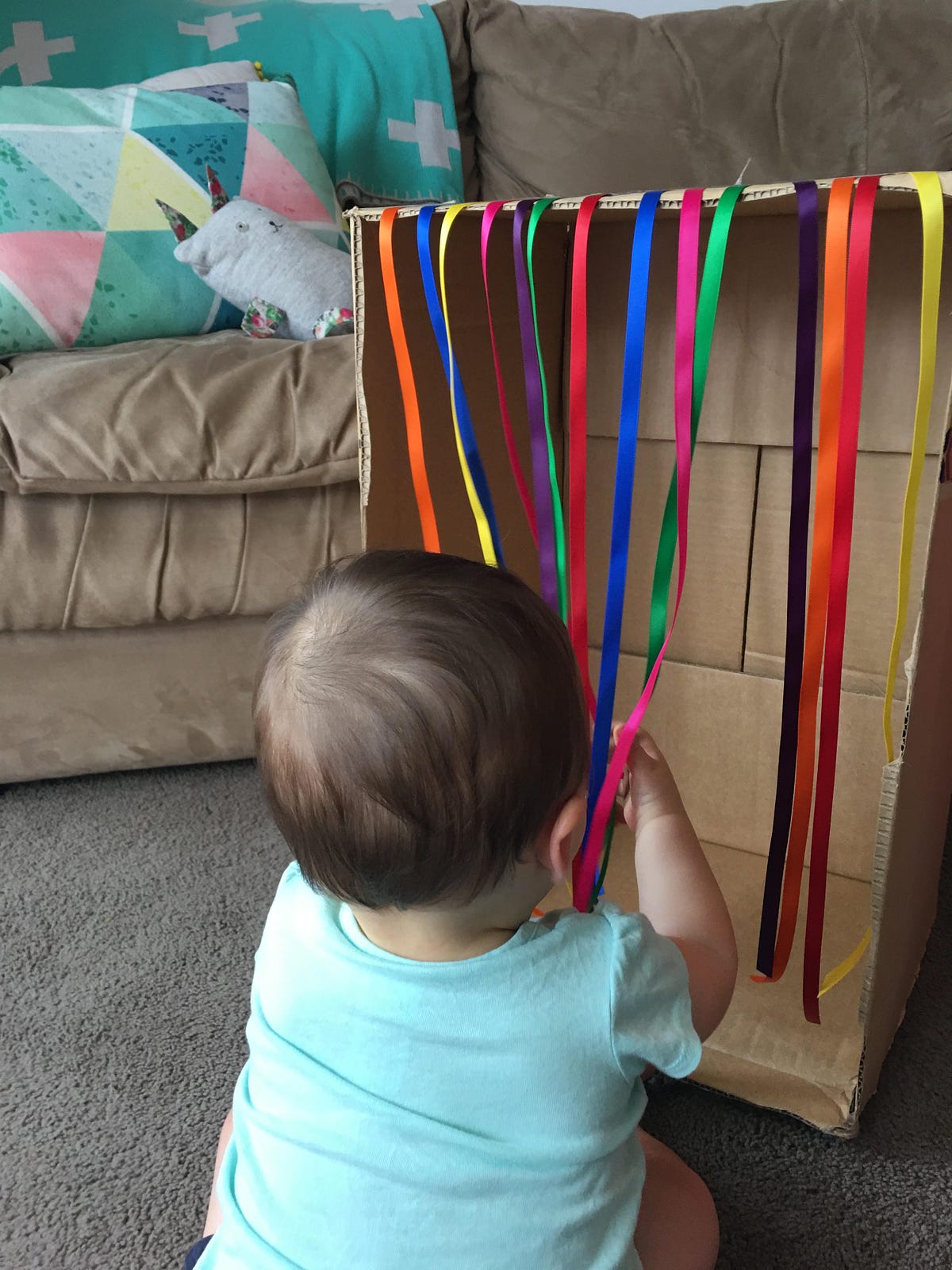 Ribbon Box Baby Play – Learning Through Play