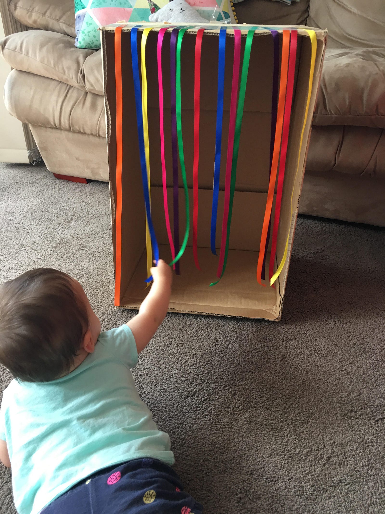 Ribbon Box Baby Play – Learning Through Play