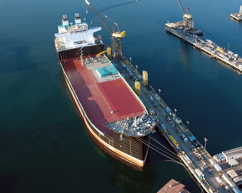 Oil Tanker-Turned-Aircraft Carrier Is Key to American Naval Expansion